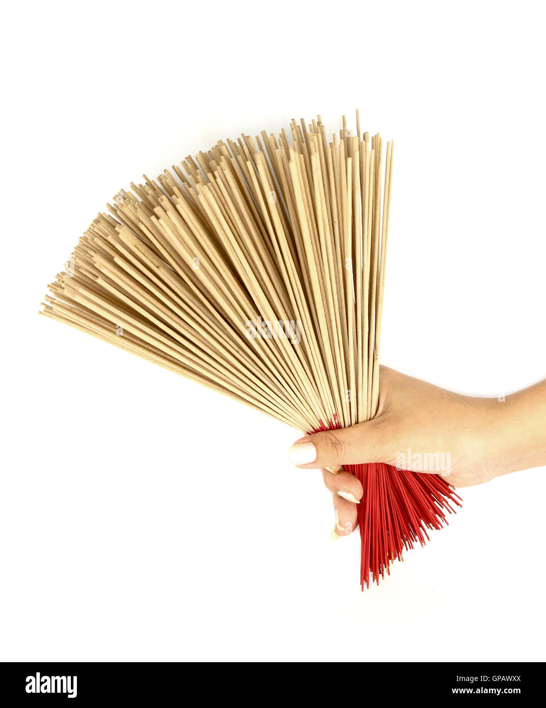 hand holding incense on white background Stock Photo - Alamy