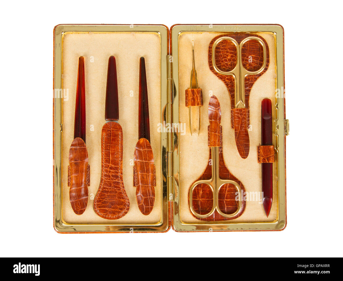 Manicure set - golden tools Stock Photo - Alamy
