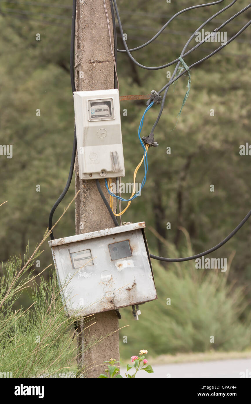 Cabinet with electrical meter on a concrete pole Stock Photo - Alamy