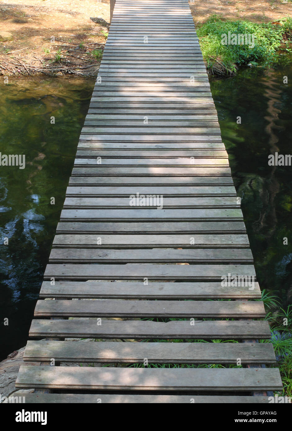 wooden walkway path on stream Stock Photo - Alamy
