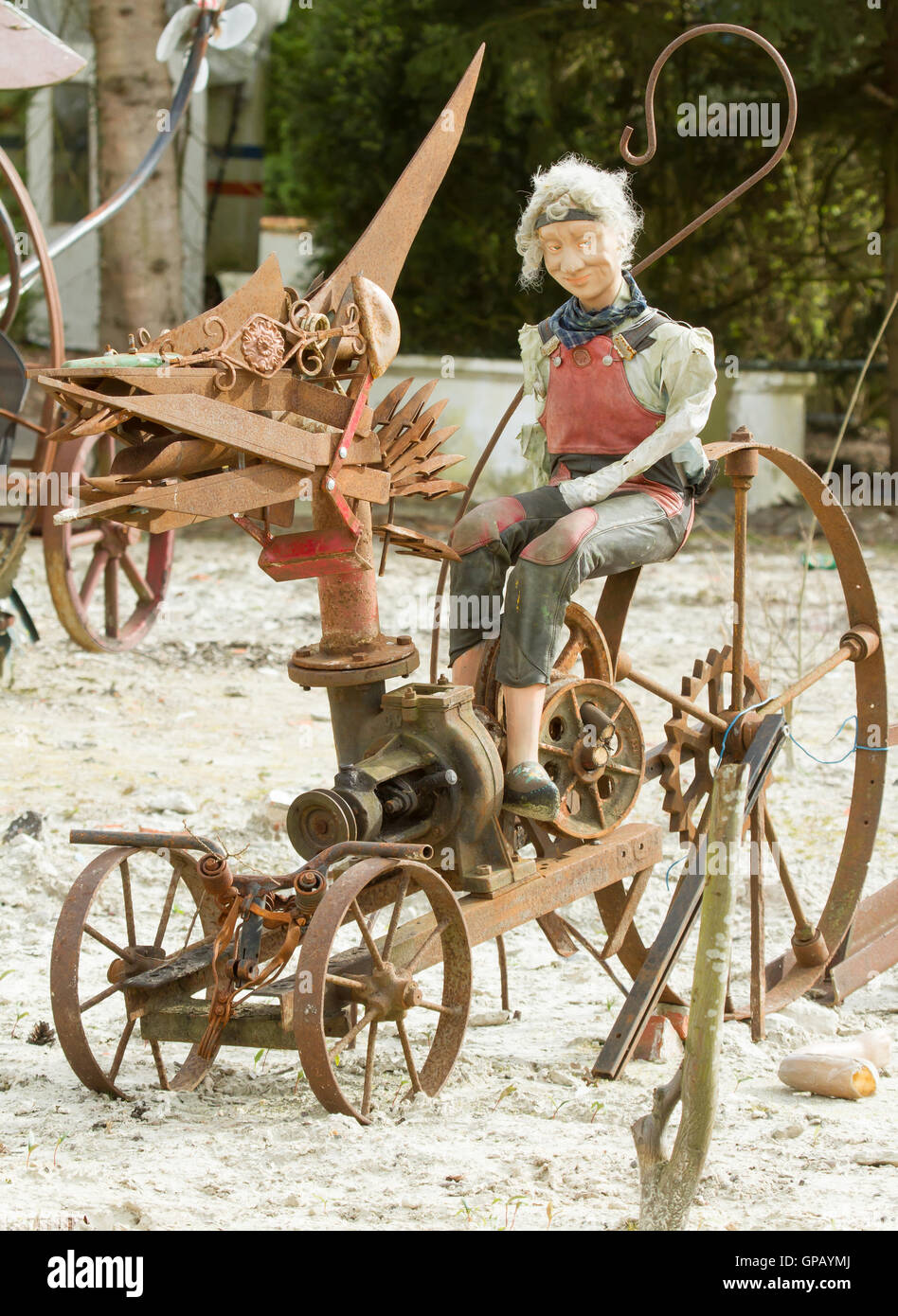 An old plastic statue of a man Stock Photo - Alamy