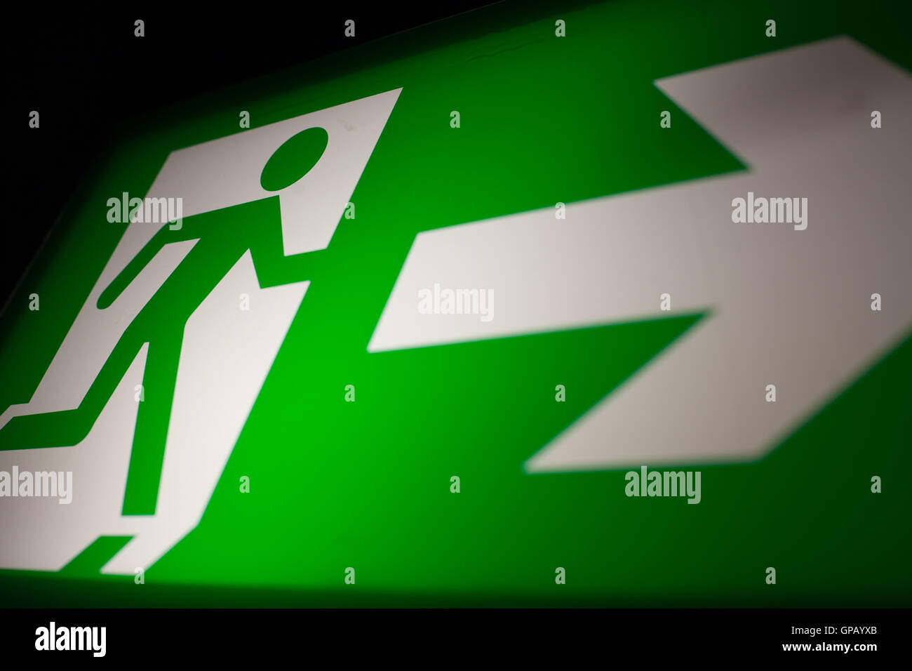 Close up shot of an emergency exit sign Stock Photo - Alamy