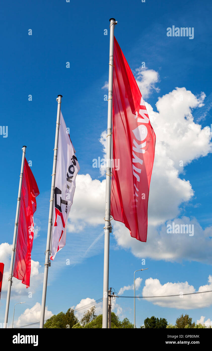 The flags of the oil company Lukoil on the gas station Stock Photo - Alamy