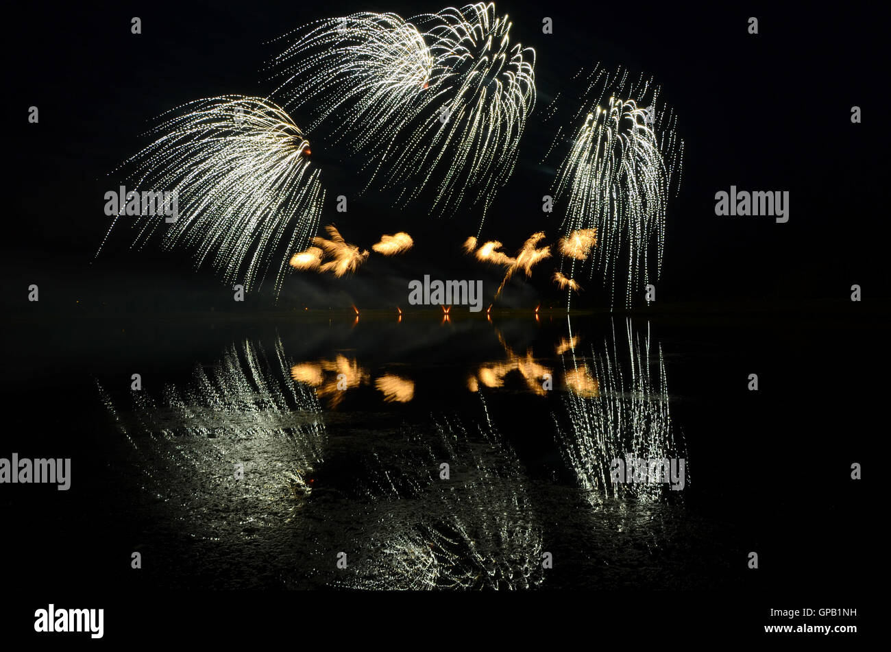 Dark fireworks display reflection Stock Photo - Alamy
