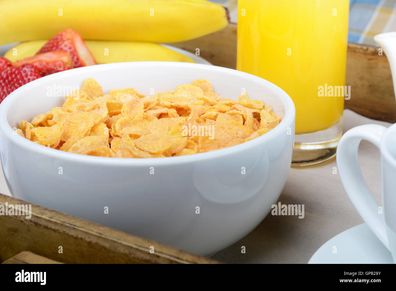 Close up of breakfast tray with orange juice, cereals and fruits Stock ...