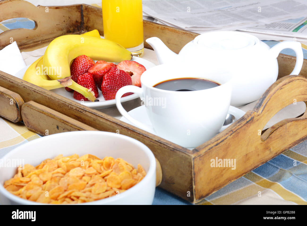 Breakfast tray with coffee, orange juice, cereals and fruits Stock ...