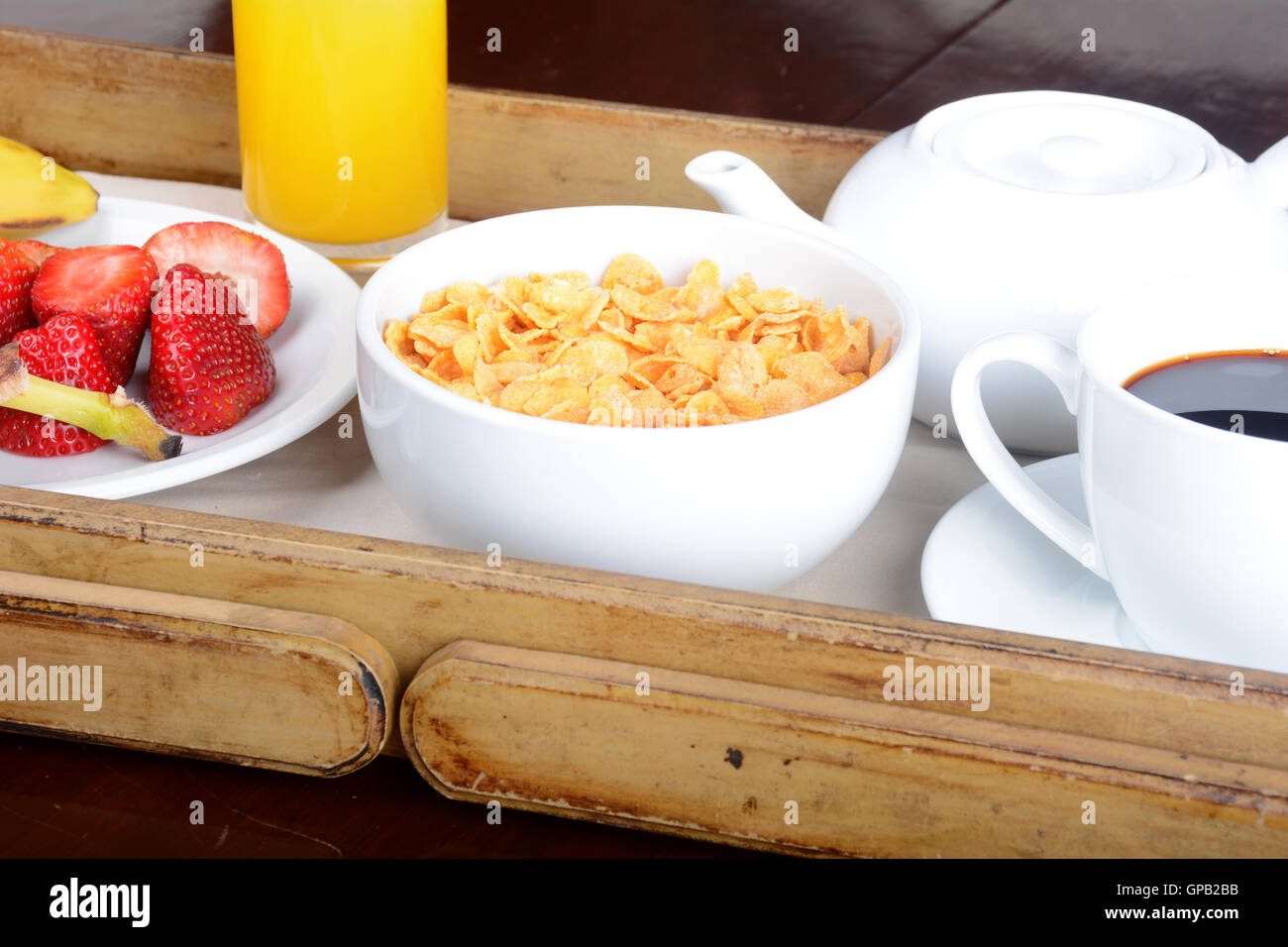 Breakfast tray with coffee, orange juice, cereals and fruits Stock ...