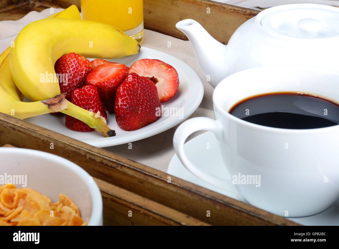 Breakfast tray with coffee, orange juice, cereals and fruits Stock ...