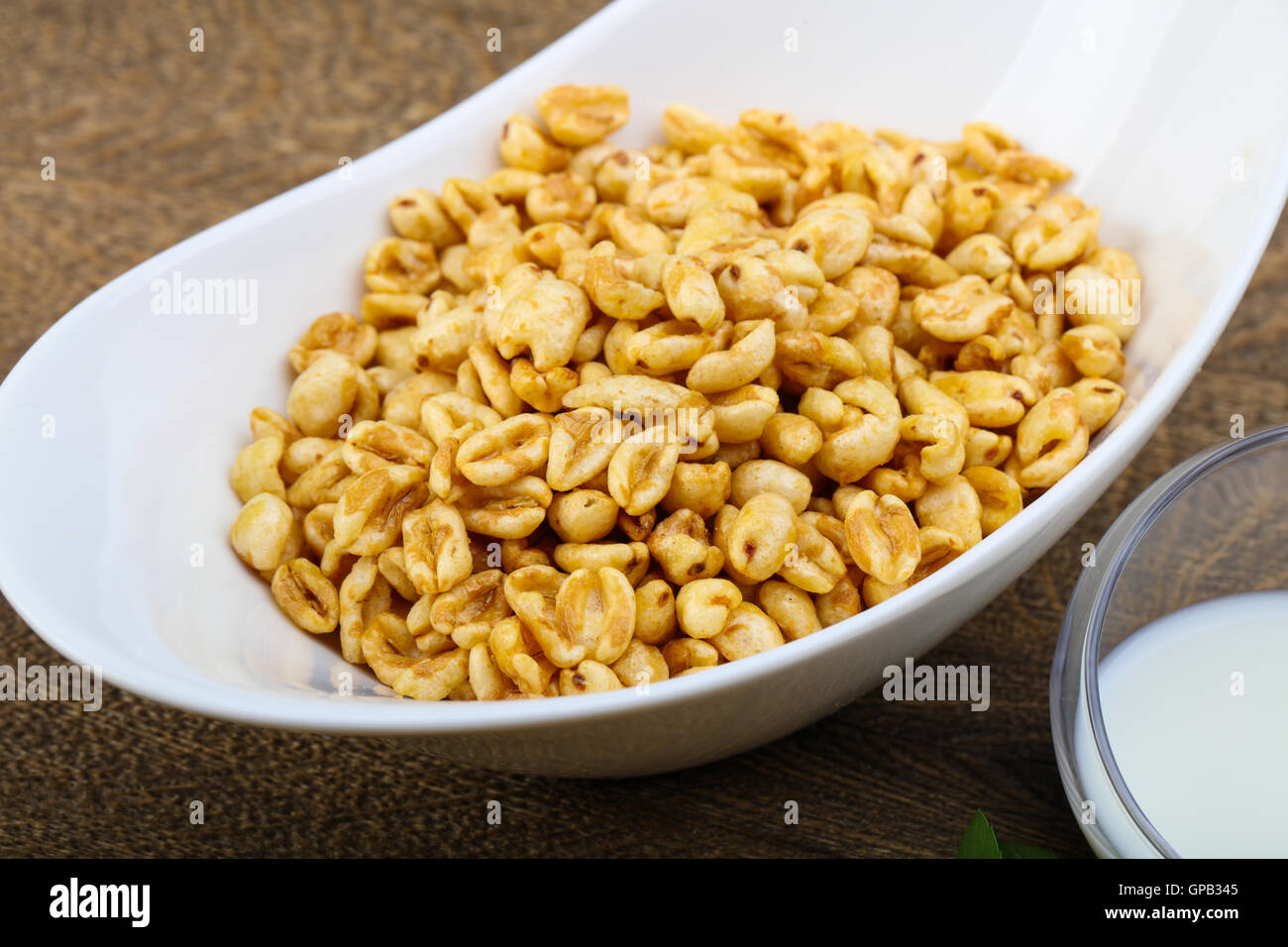 Rise flakes with milk, raisin and mint leaves Stock Photo - Alamy