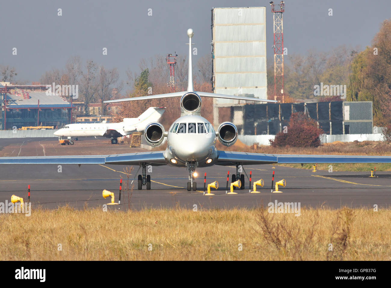 Business jet in the airport front view Stock Photo - Alamy