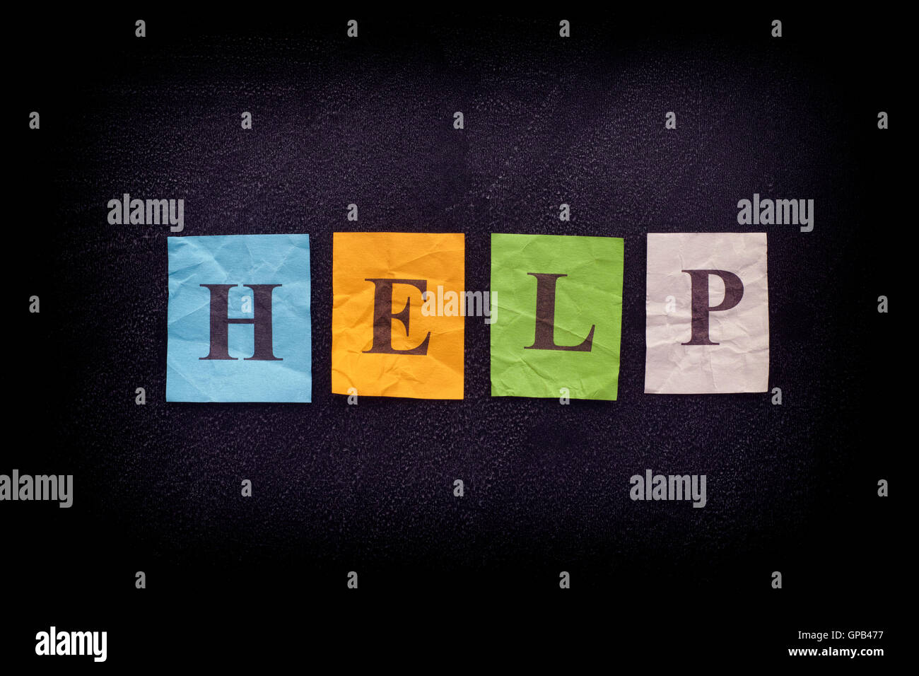 Help. Colorful paper notes with the word Help. Concept Image. Closeup ...