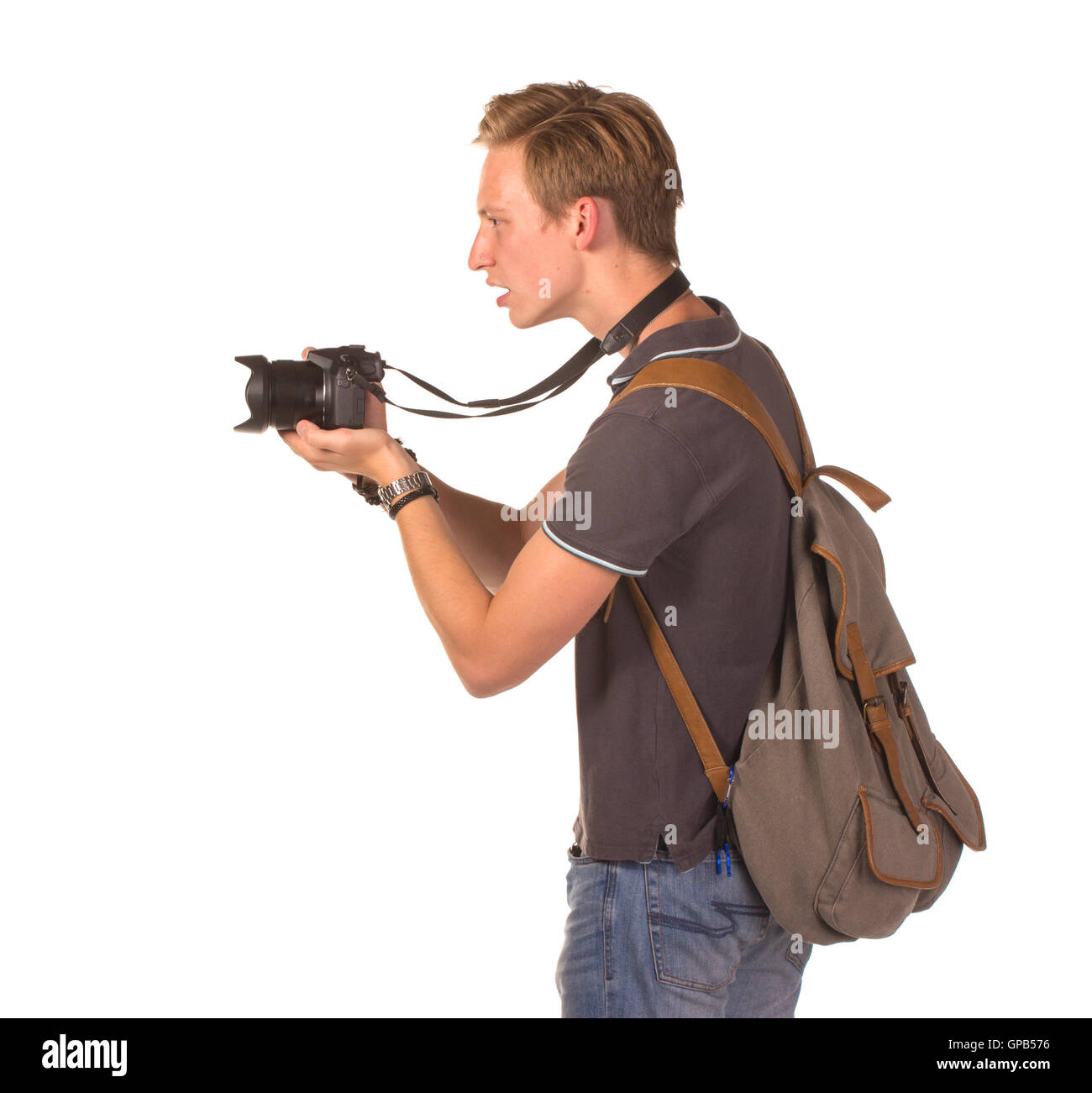 Closeup portrait of a young man taking a picture from corner over white ...