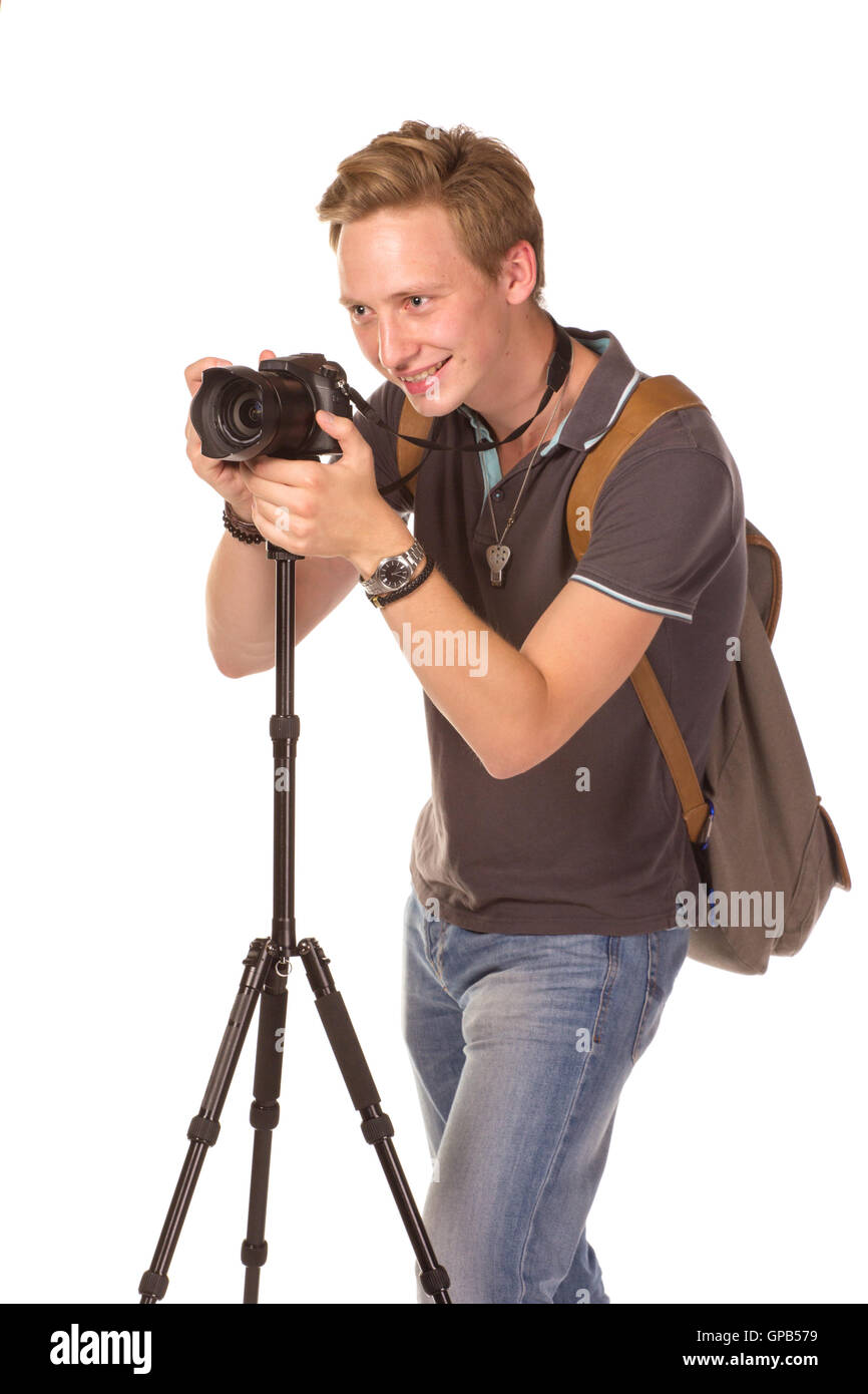 Closeup portrait of a young man taking a picture from corner over white ...