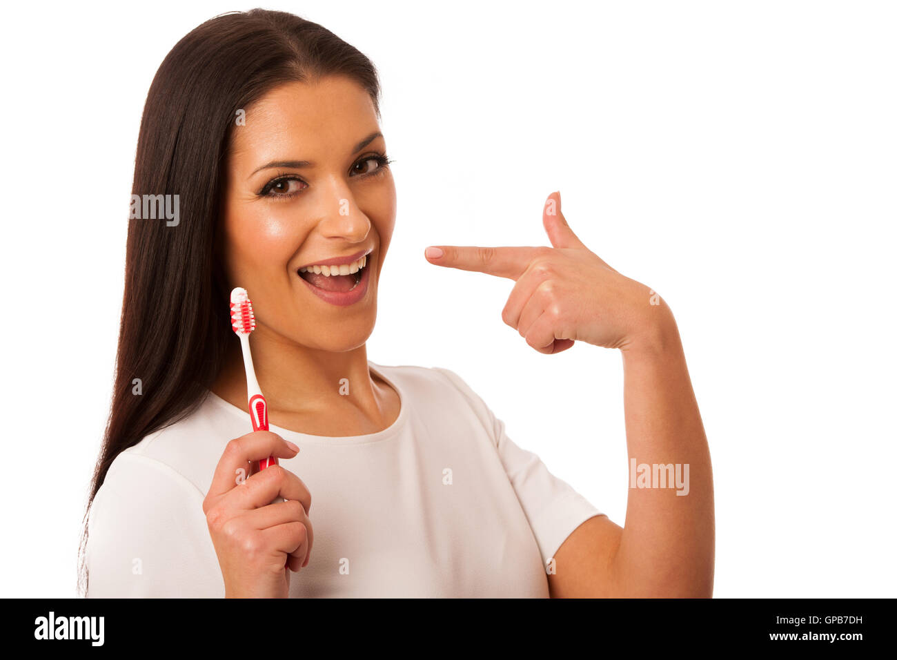 Woman cleaning teeth with toothbrush for perfect hygiene and healthy ...