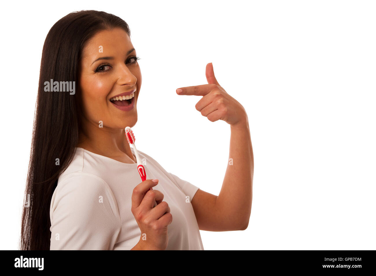 Woman cleaning teeth with toothbrush for perfect hygiene and healthy ...