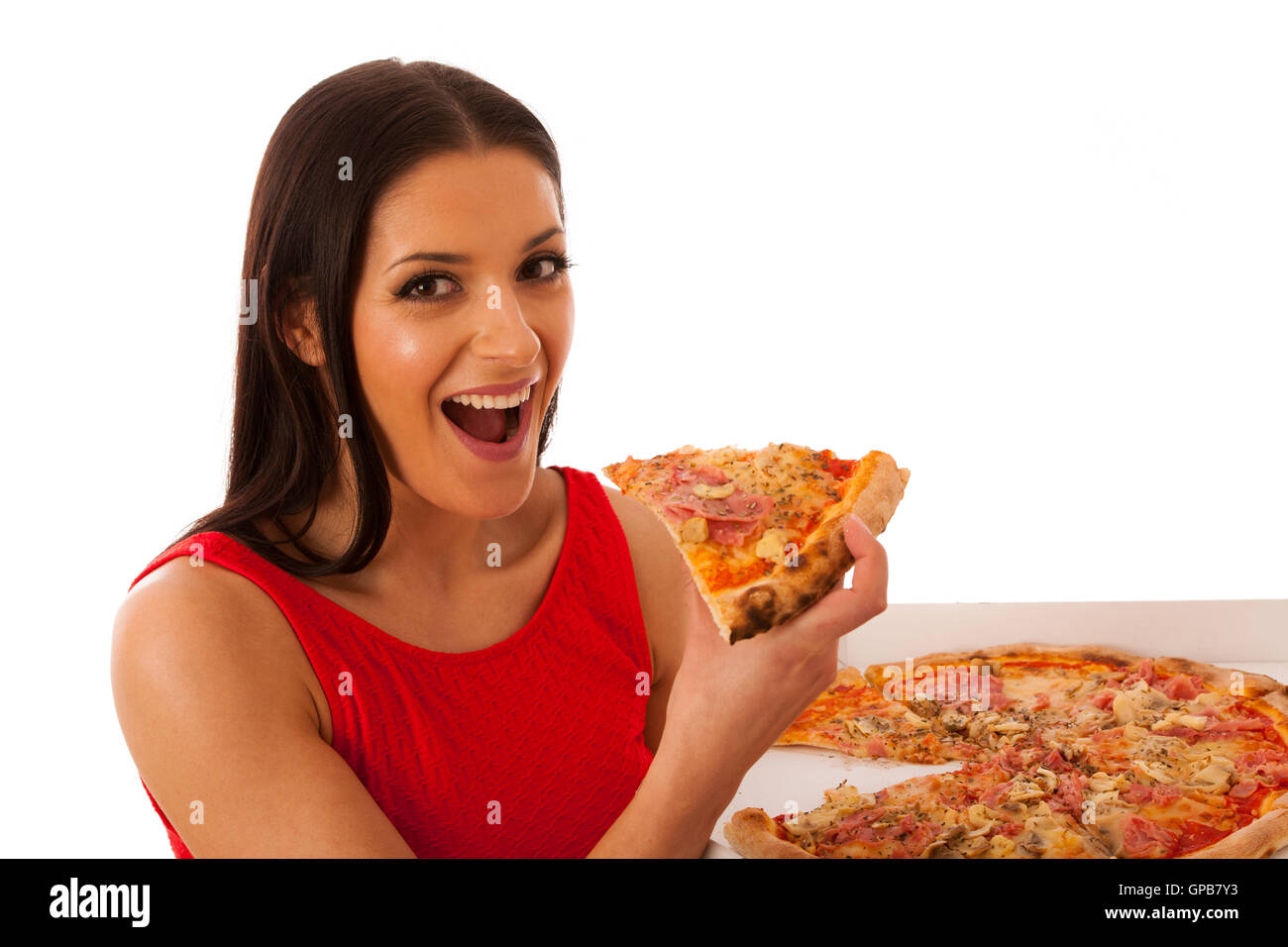 Young woman eating pizza isolated over white background Stock Photo - Alamy