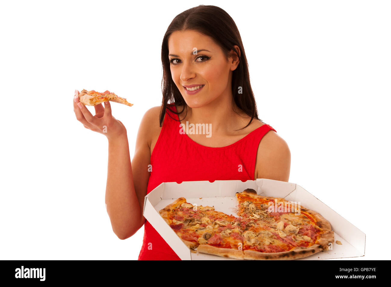 Young woman eating pizza isolated over white background Stock Photo - Alamy