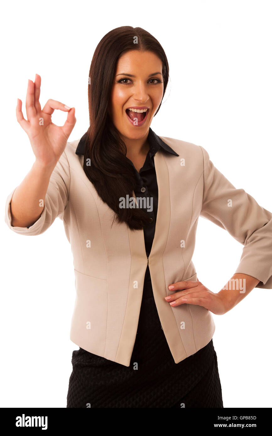 Woman gesturing success with ok sign and big happy smile Stock Photo ...