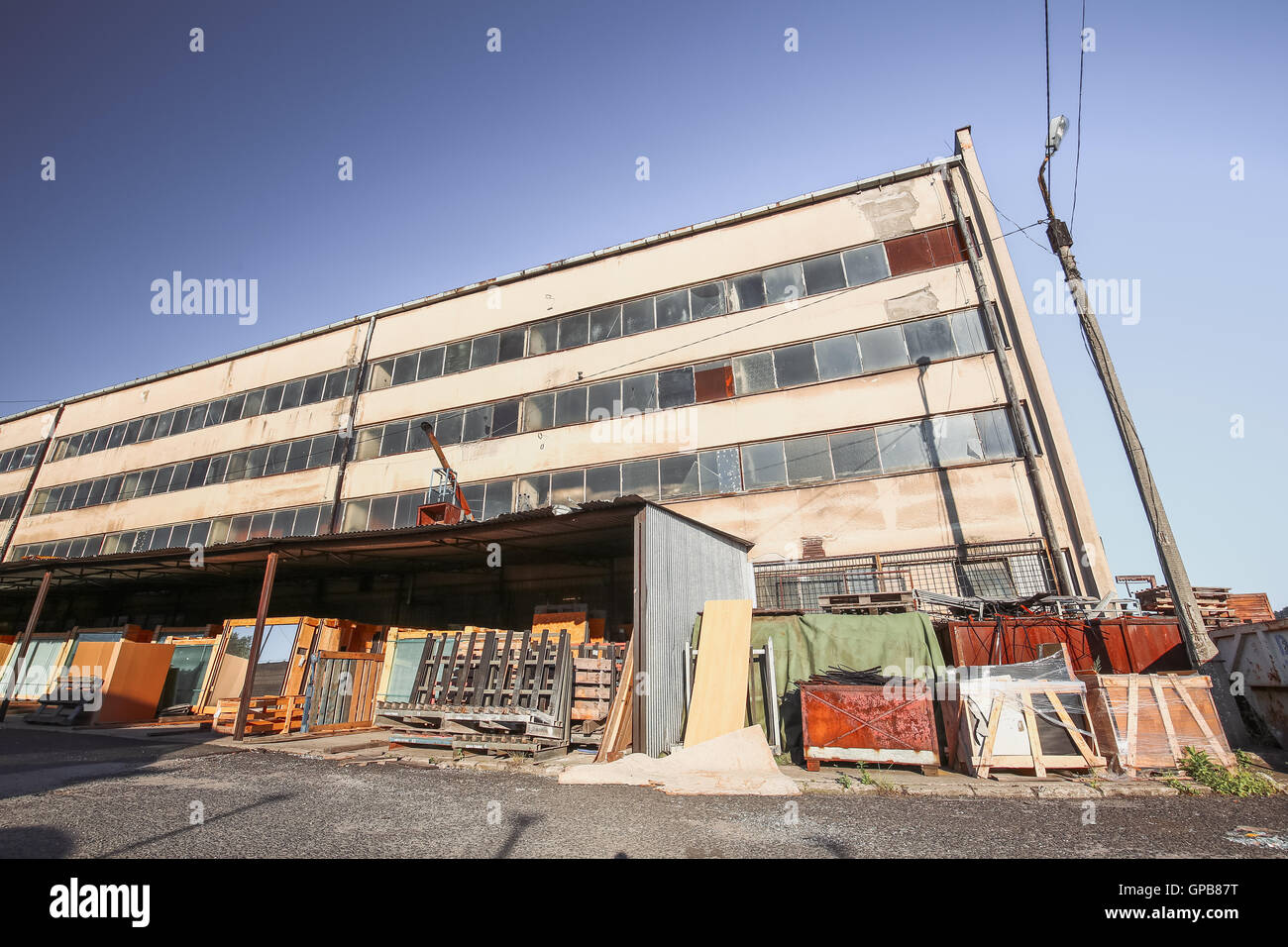 View of the old communist factory Stock Photo - Alamy