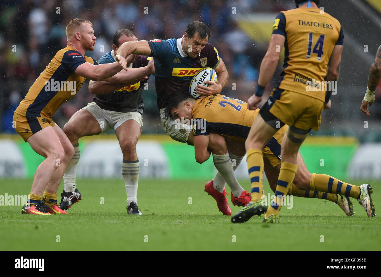 Harlequins' Tim Visser is tackled by Bristol Rugby's Ben Mosses of ...