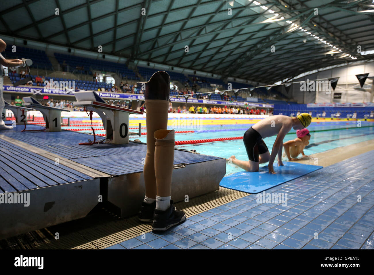 General view of swimmers getting out of the pool with a pair of ...