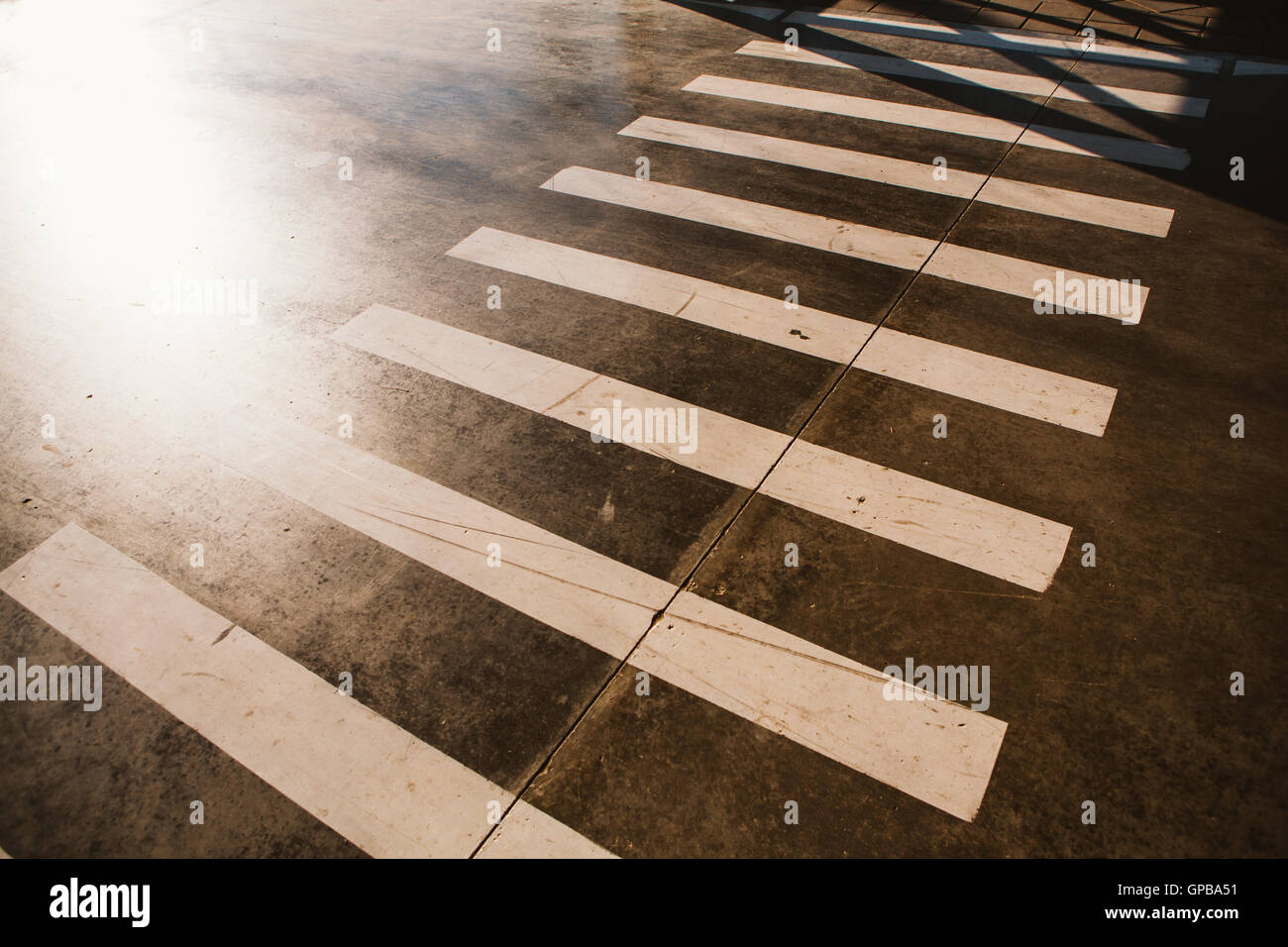 crosswalk zebra on background of asphalt in the summer Stock Photo - Alamy