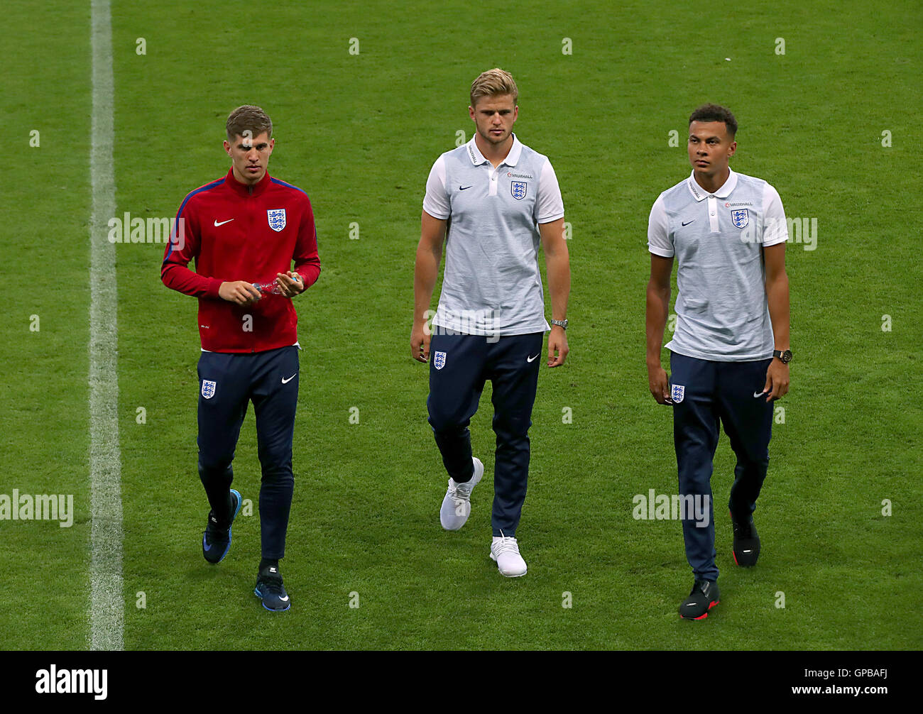 (left to right) John Stones, Eric Dier and Dele Alli during a ...