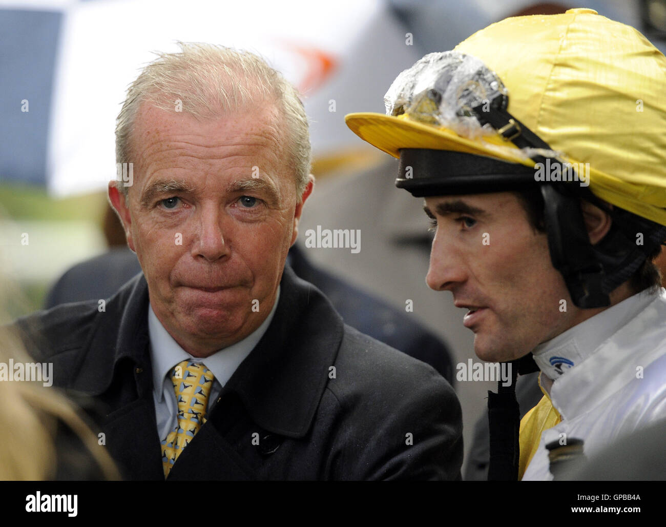 Trainer of Quiet Reflection Karl Burke with his jockey Dougie Costello ...