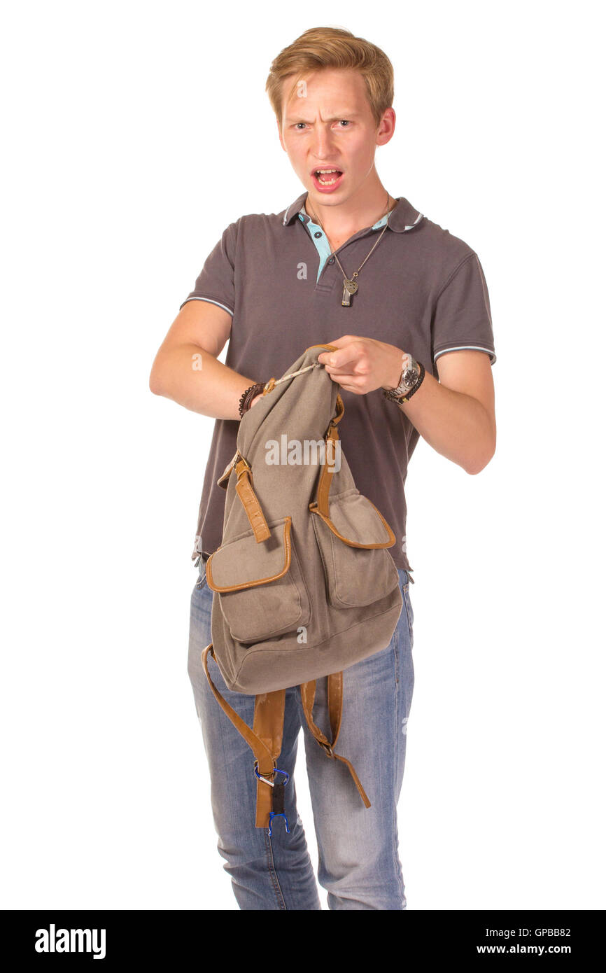 Young shocked student opening his backpack. Isolated on white ...