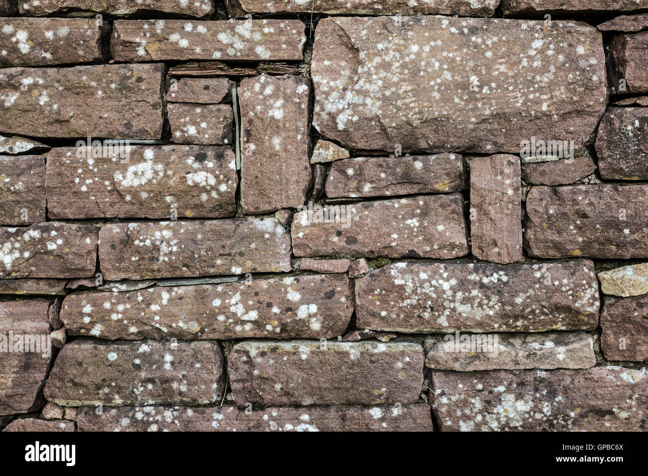 wall made from natural stones Stock Photo - Alamy