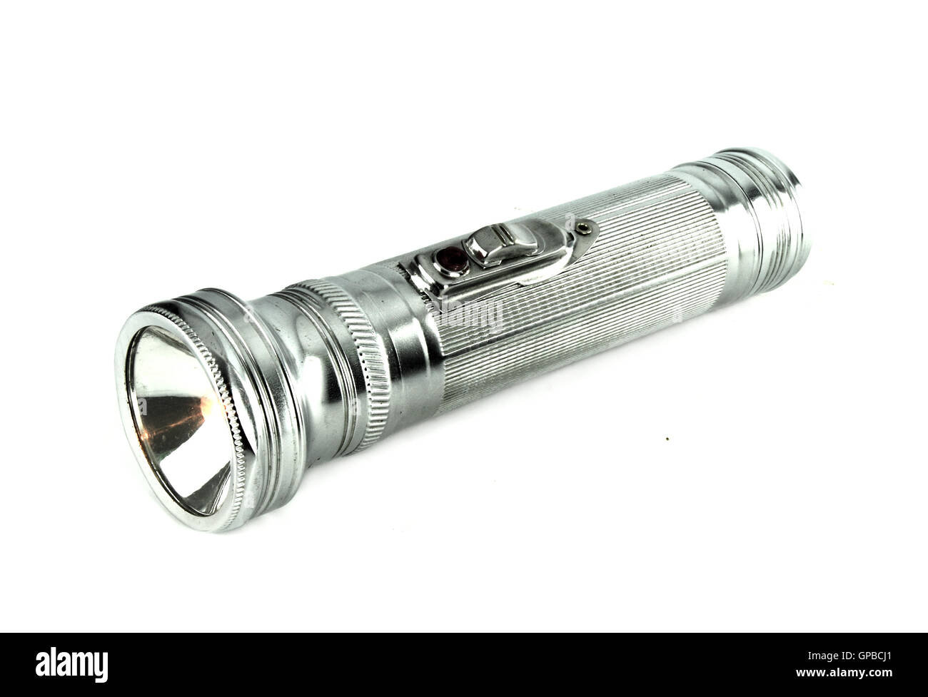 A vintage flashlight on its side Stock Photo - Alamy