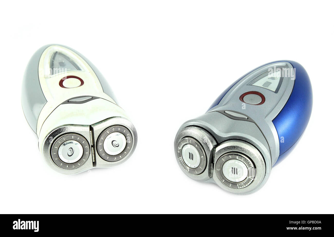 two electric shaver isolated with white background Stock Photo - Alamy