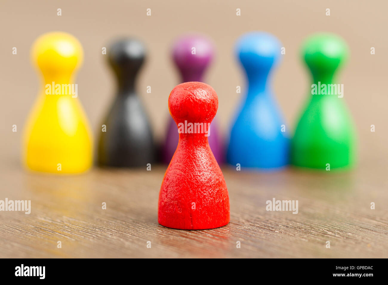 Six colored pawns isolated Stock Photo - Alamy