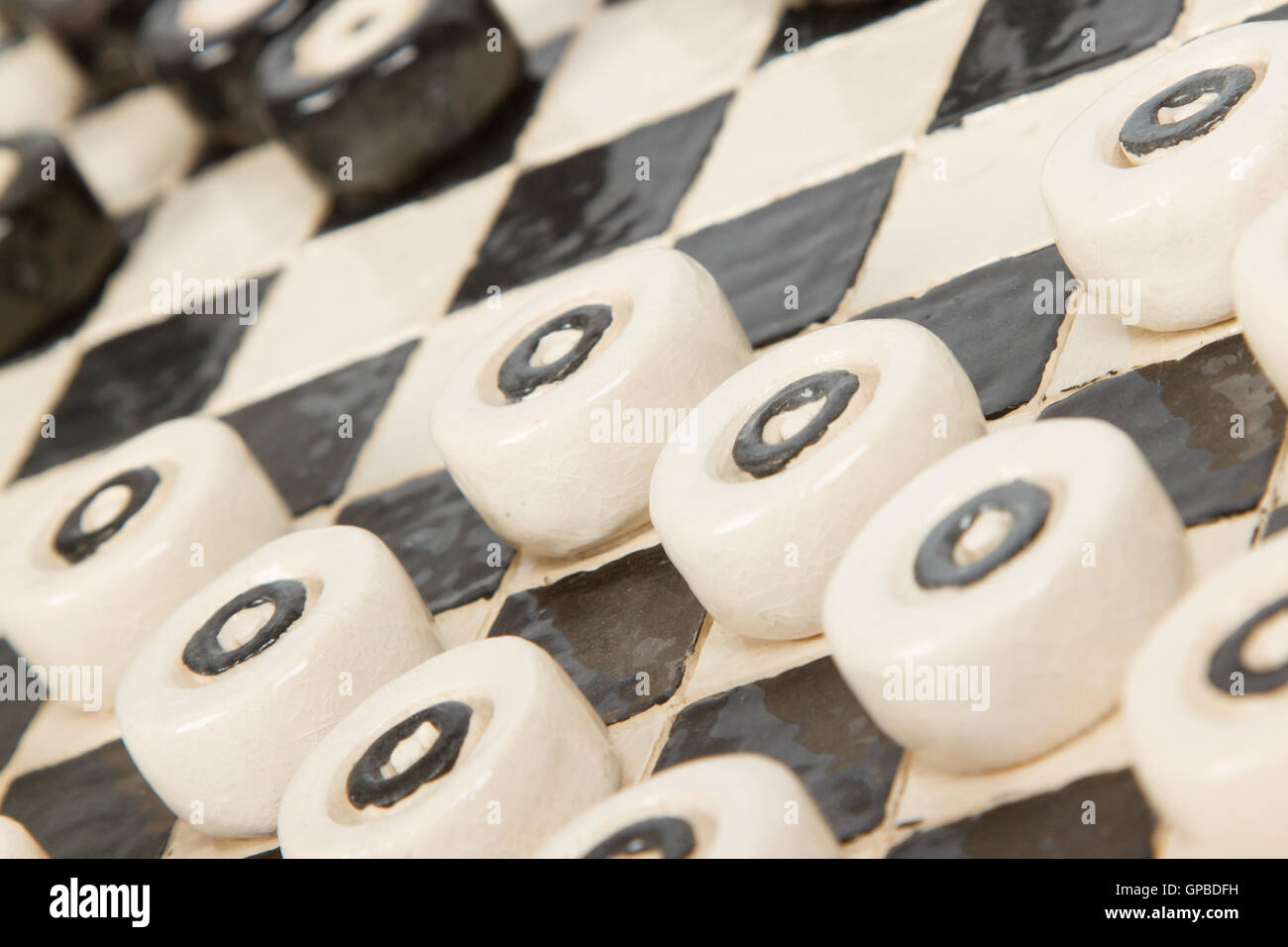 Very old game of checkers, pottery Stock Photo - Alamy