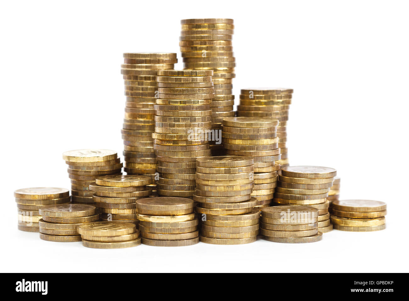 Towers of golden coins Stock Photo - Alamy