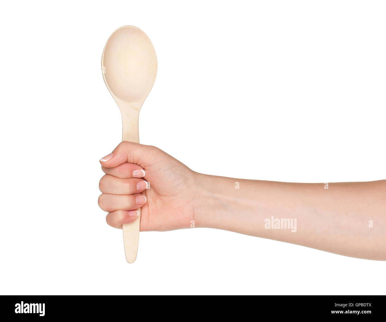 Hand with spoon Stock Photo - Alamy