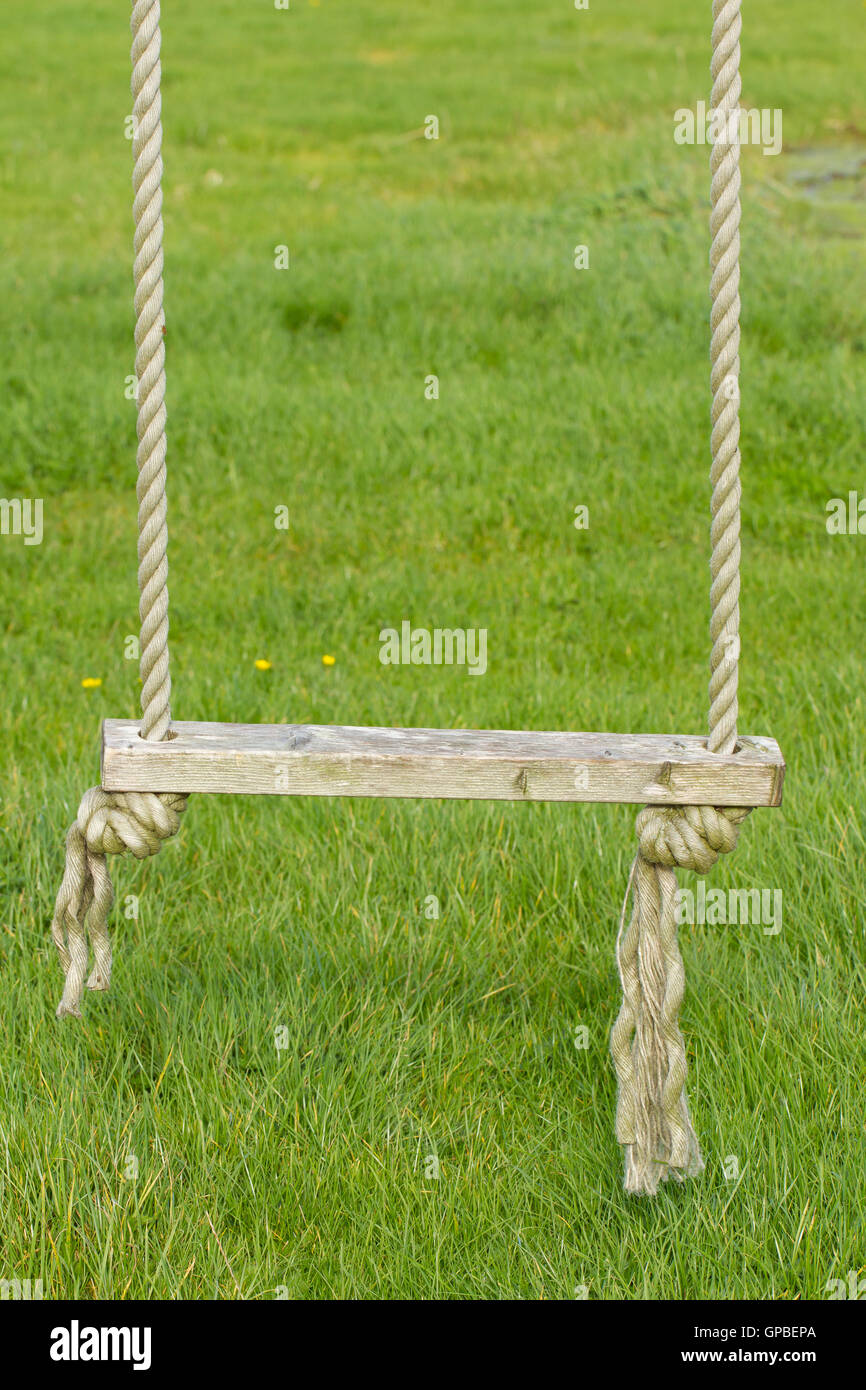 Old wooden tree swing Stock Photo - Alamy