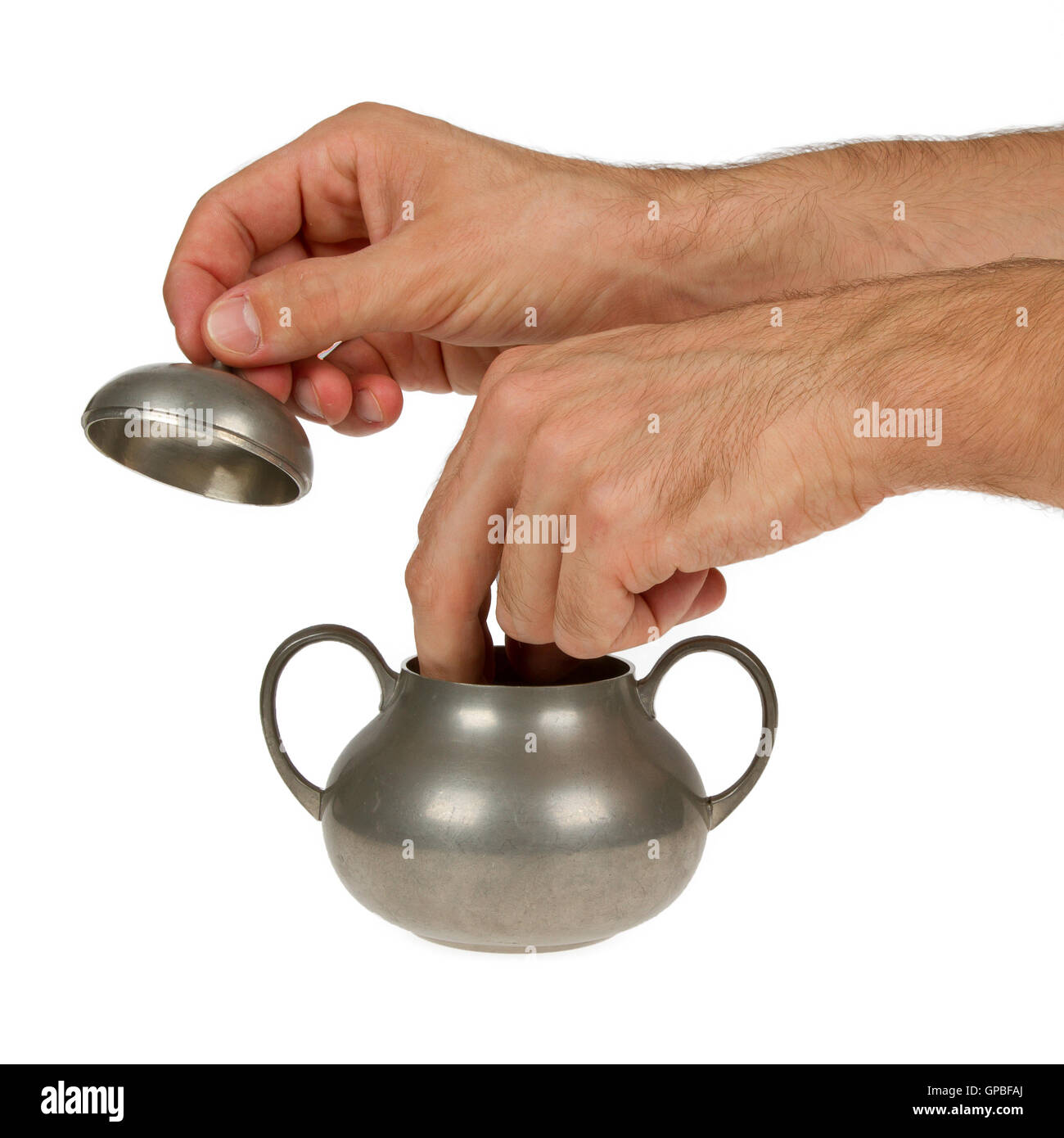 Very old tin sugar pot full of scratches Stock Photo - Alamy