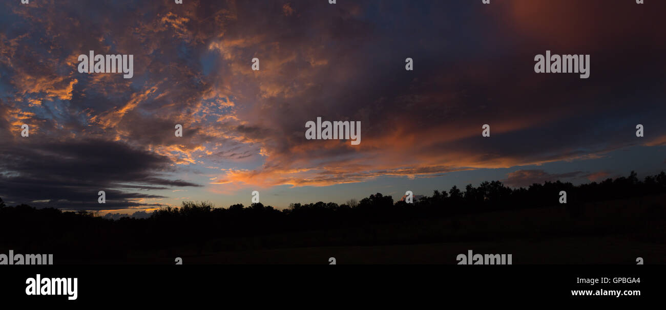 A panoramic sunset over woodlands in Indiana, United States Stock Photo ...