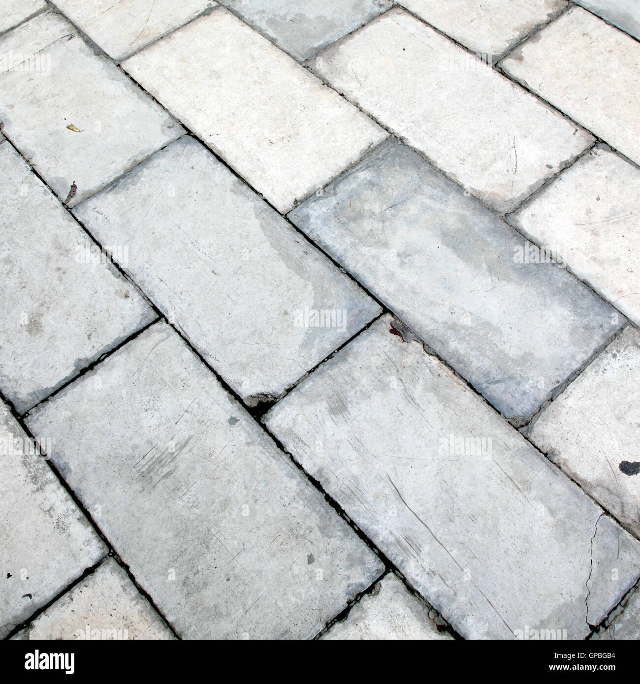 square brick tile walkway background Stock Photo - Alamy