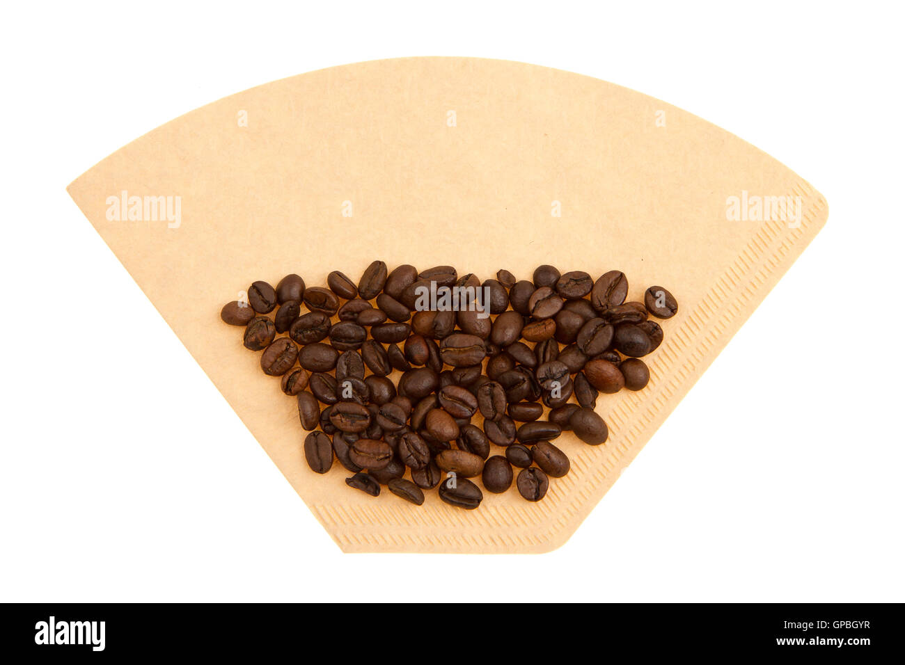 Coffee beans on a coffee filter (white background Stock Photo - Alamy