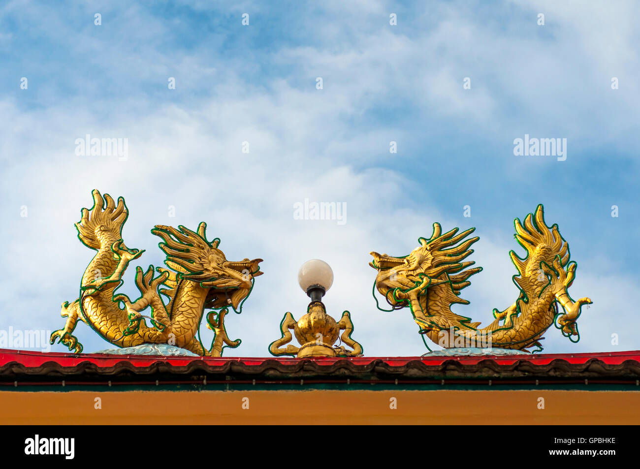 twin gold dragon statues Stock Photo - Alamy