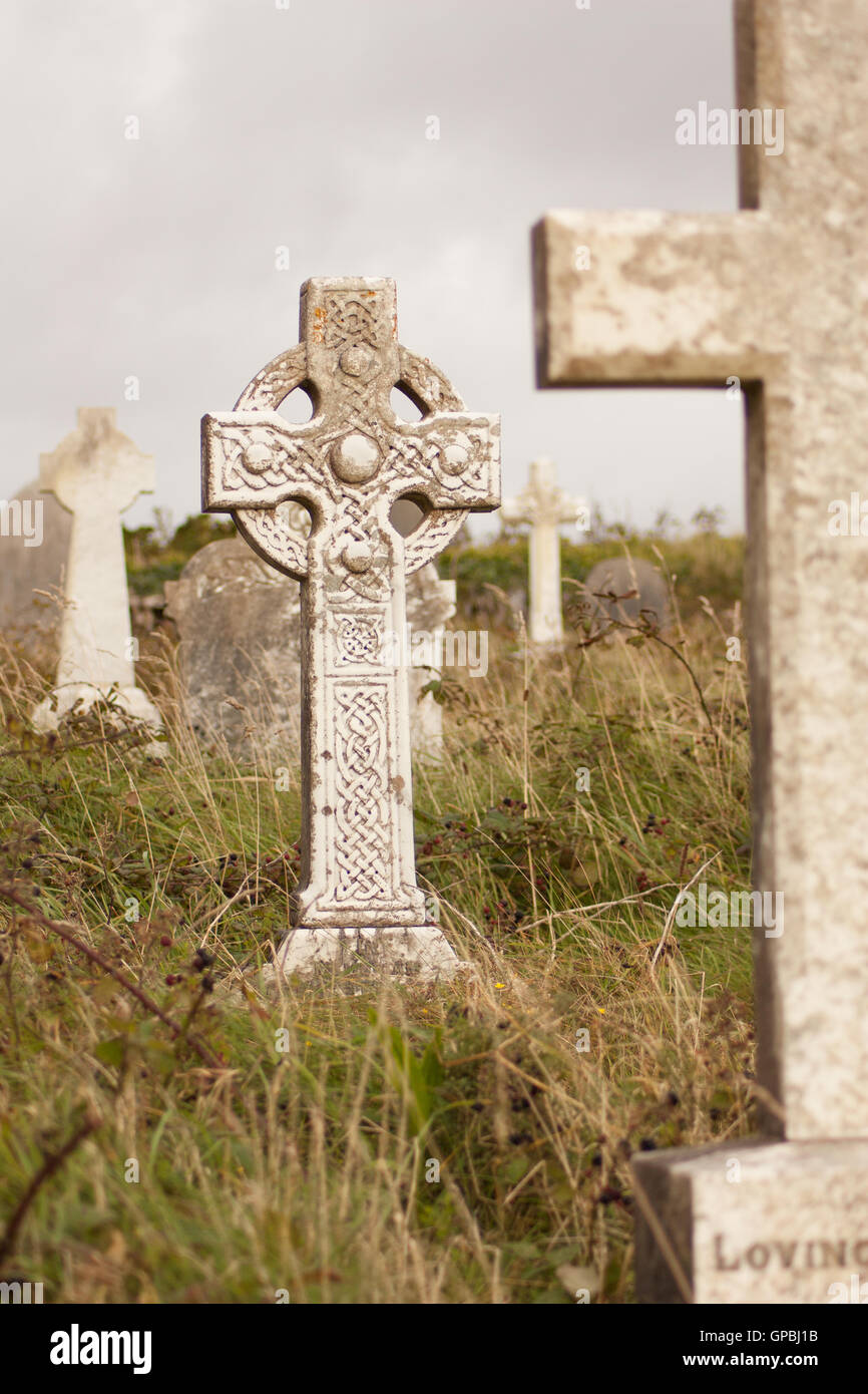 Irish cross marker on grave hi-res stock photography and images - Alamy