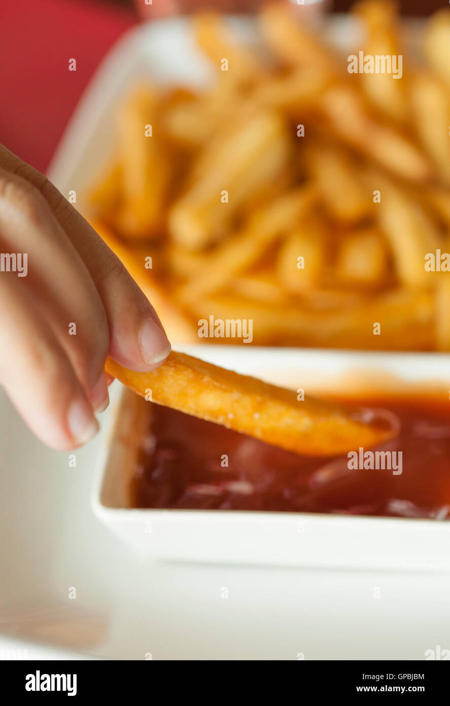 French Fries with Barbecue dipping Stock Photo - Alamy