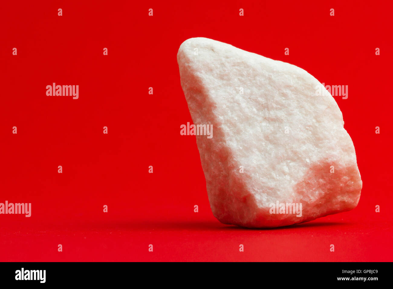 Glittering white stone isolated Stock Photo - Alamy