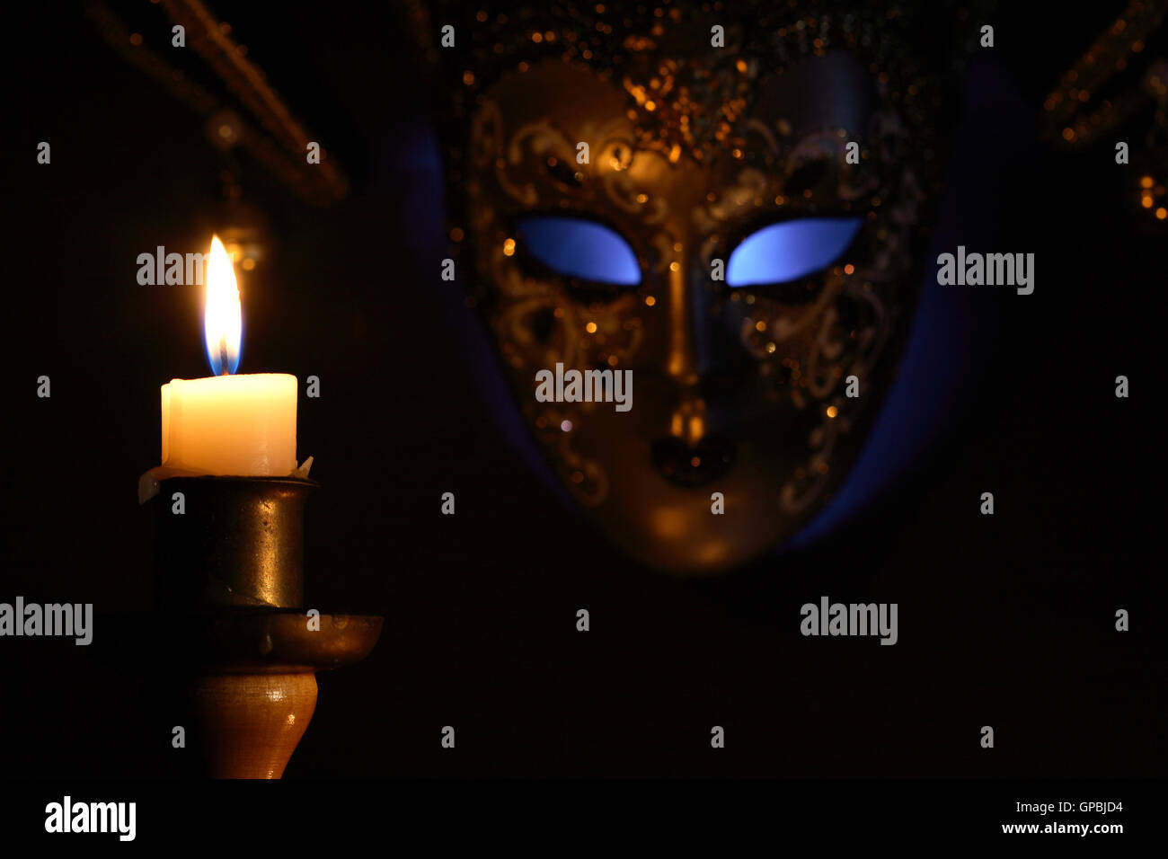Candle And Mask Stock Photo - Alamy