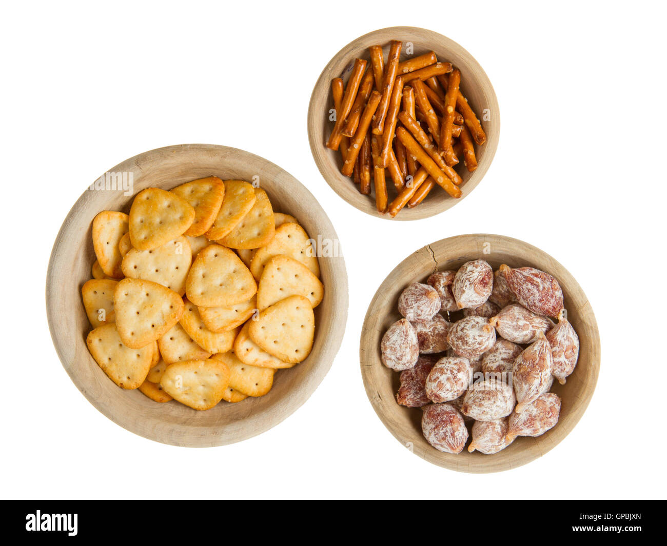 Italian salami and typical dutch salty snacks in wooden bowl Stock ...