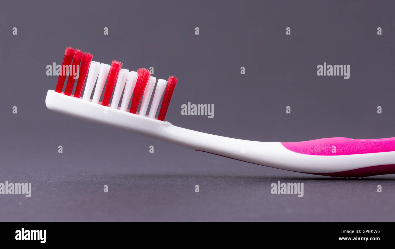 A pink toothbrush Stock Photo - Alamy
