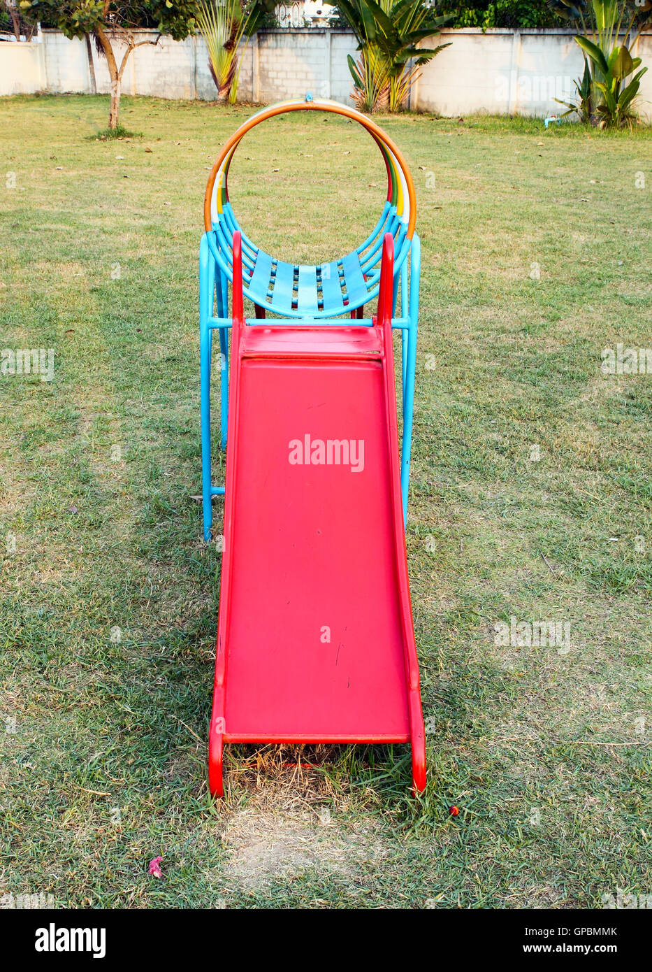 Colorful slider in children playground Stock Photo - Alamy