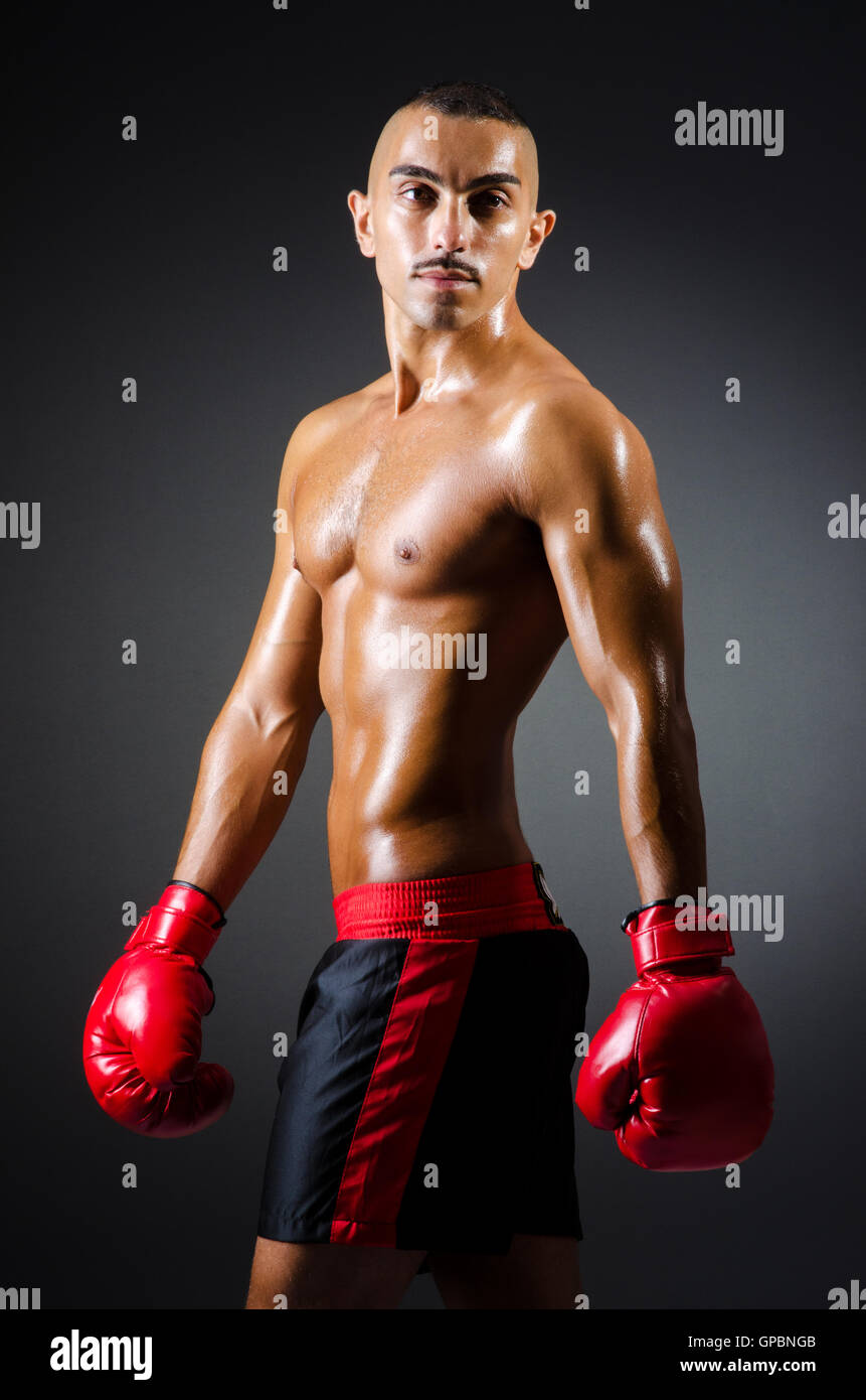 Muscular boxer in studio shooting Stock Photo - Alamy